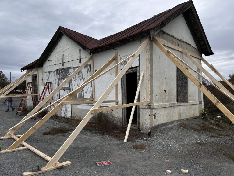 Deconstruction and documentation of former Gilberts Corner gas station ...